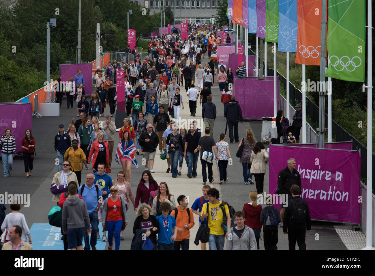 Aerial view of spectator crowds arriving across a newly-built walkway ...