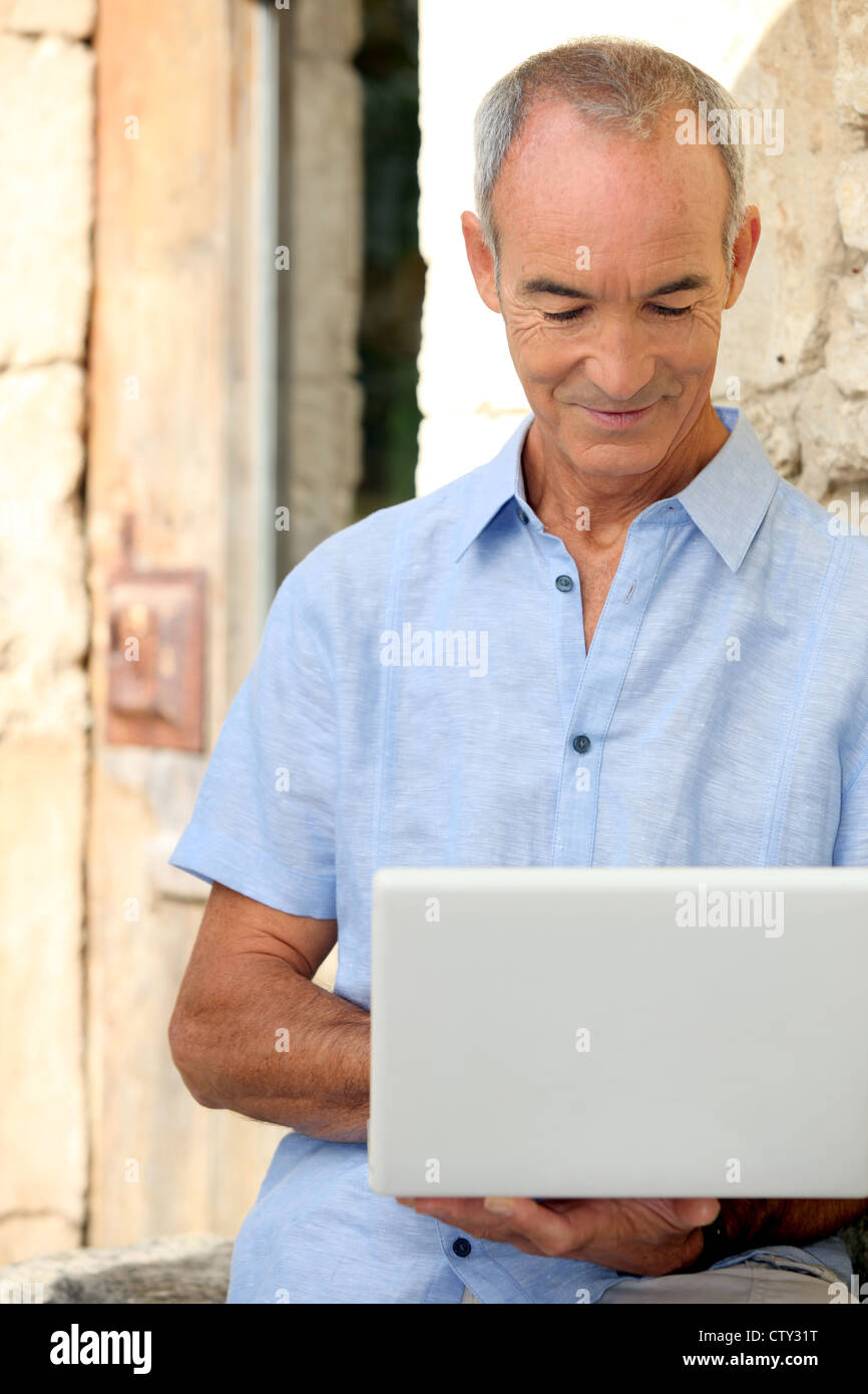 Man with computer Stock Photo - Alamy