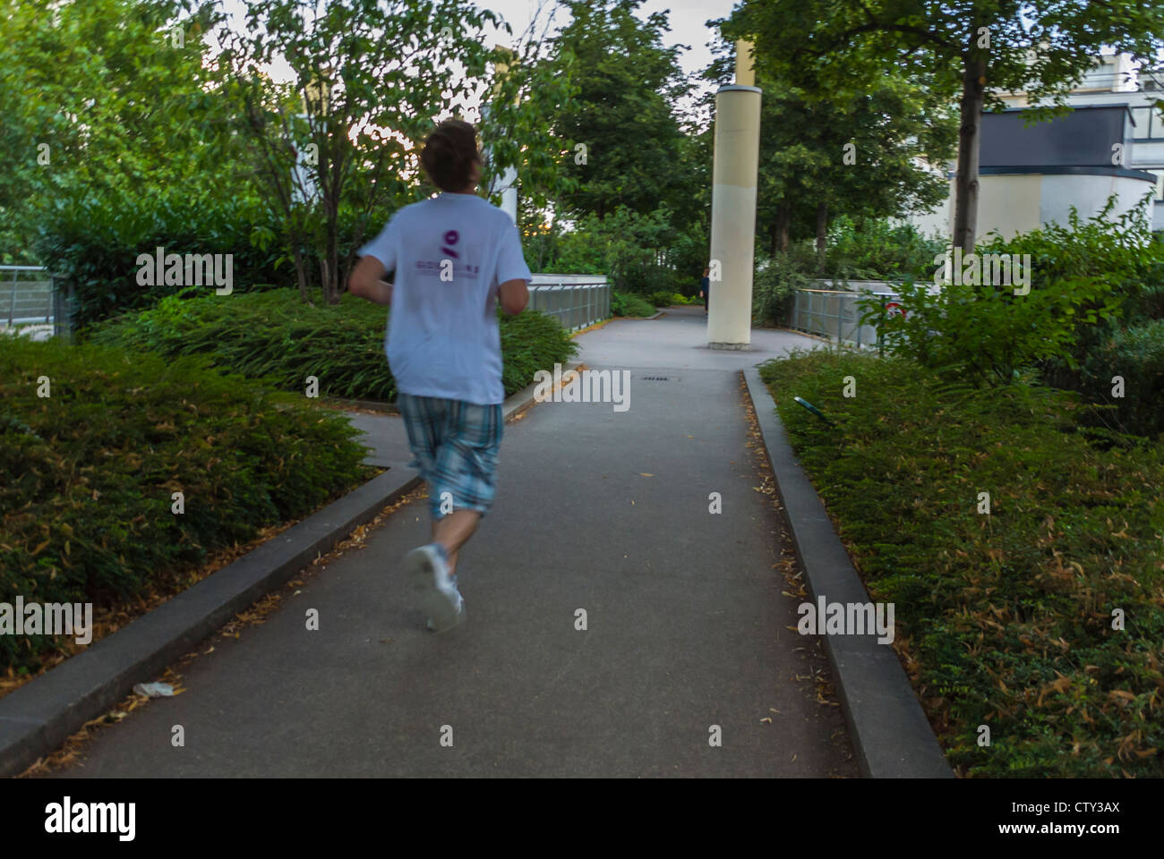 Paris, France, Man Jogging Alone, Running Away, on Pathway in ...