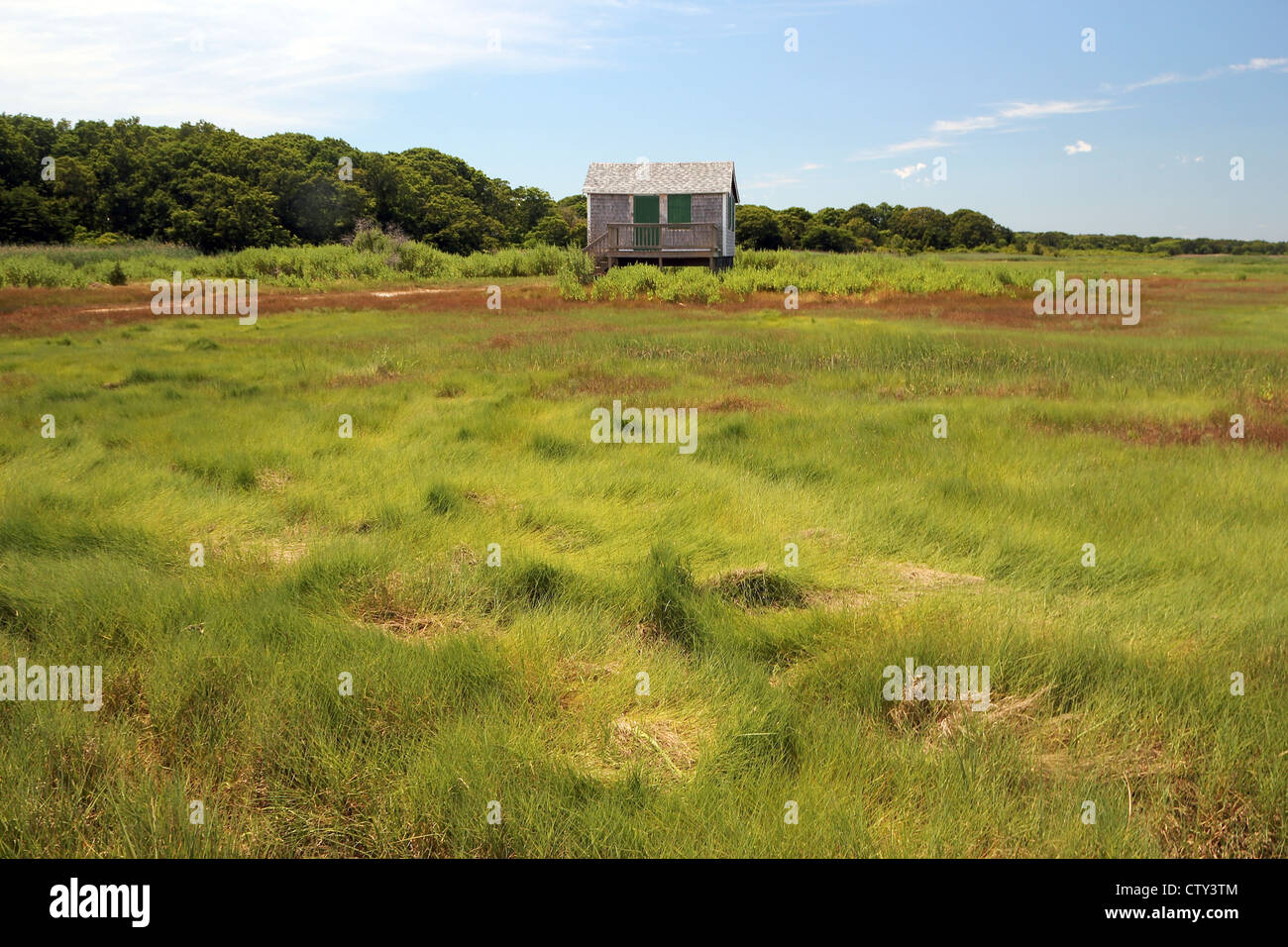 A small shingled building on Great Marsh, West Barnstable, Cape Cod ...