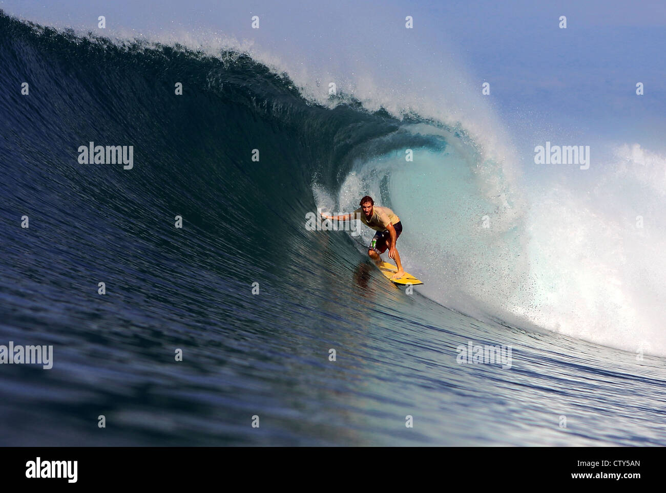 Surfer riding a barrel wave hi-res stock photography and images - Alamy