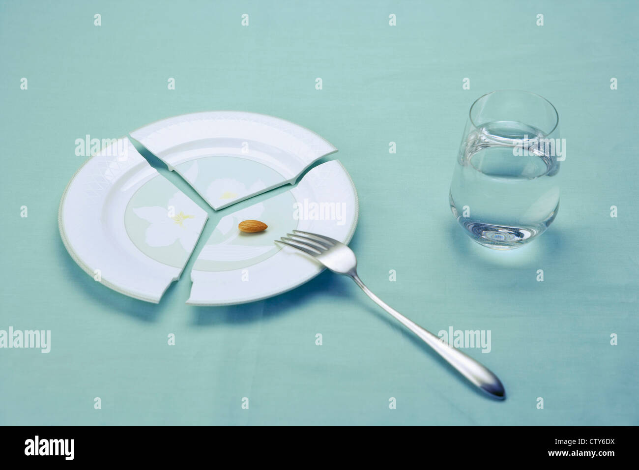 Broken dish setting Stock Photo - Alamy