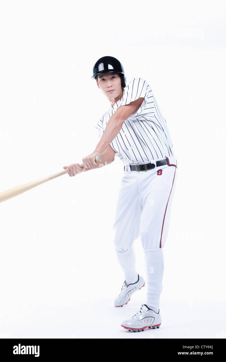 A baseball player swing the bat Stock Photo - Alamy
