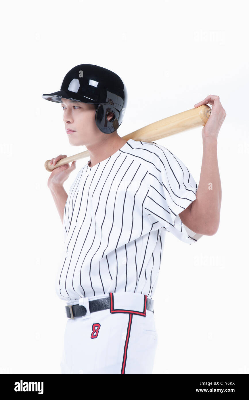 A baseball player putting the bat on his back Stock Photo - Alamy