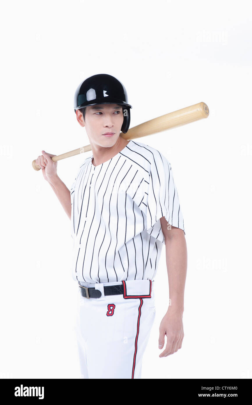 A baseball player putting the bat on his back Stock Photo - Alamy