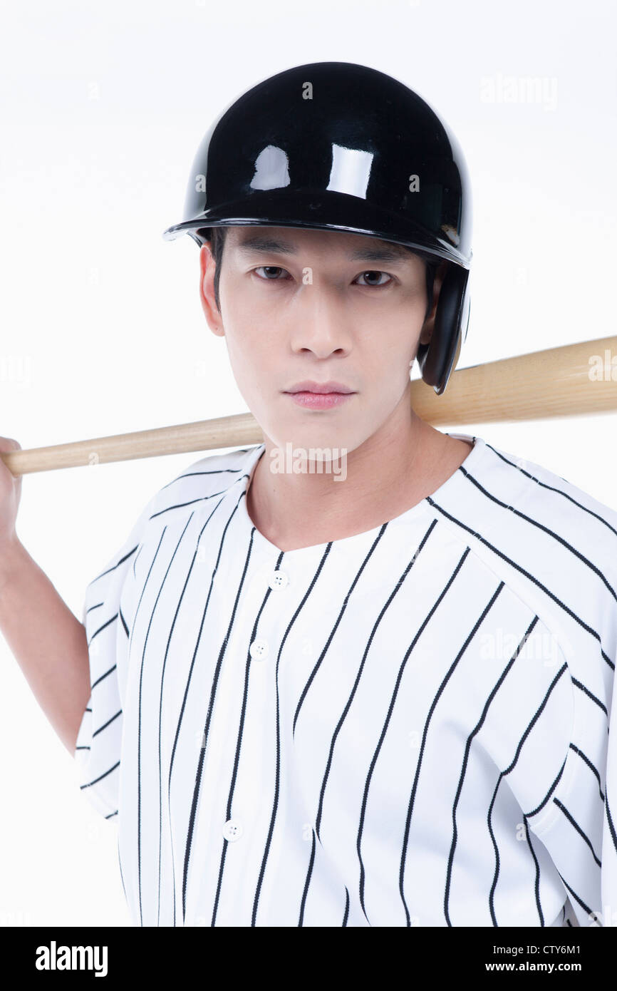 A baseball player putting the bat on his back Stock Photo - Alamy