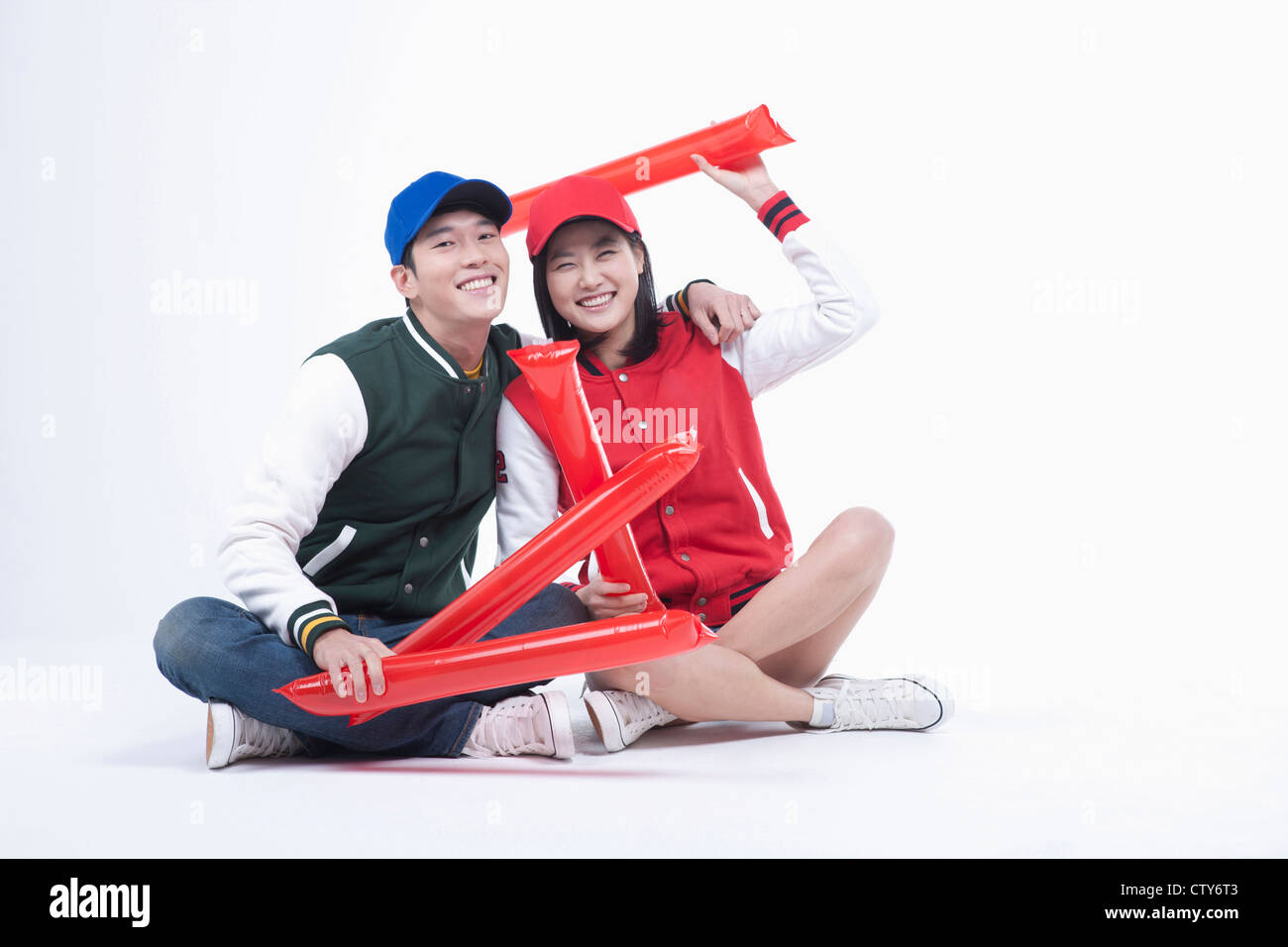 Baseball supporters with cheering tools Stock Photo - Alamy
