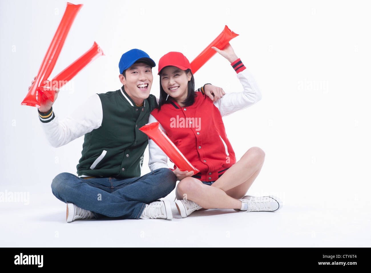 Baseball supporters with cheering tools Stock Photo - Alamy