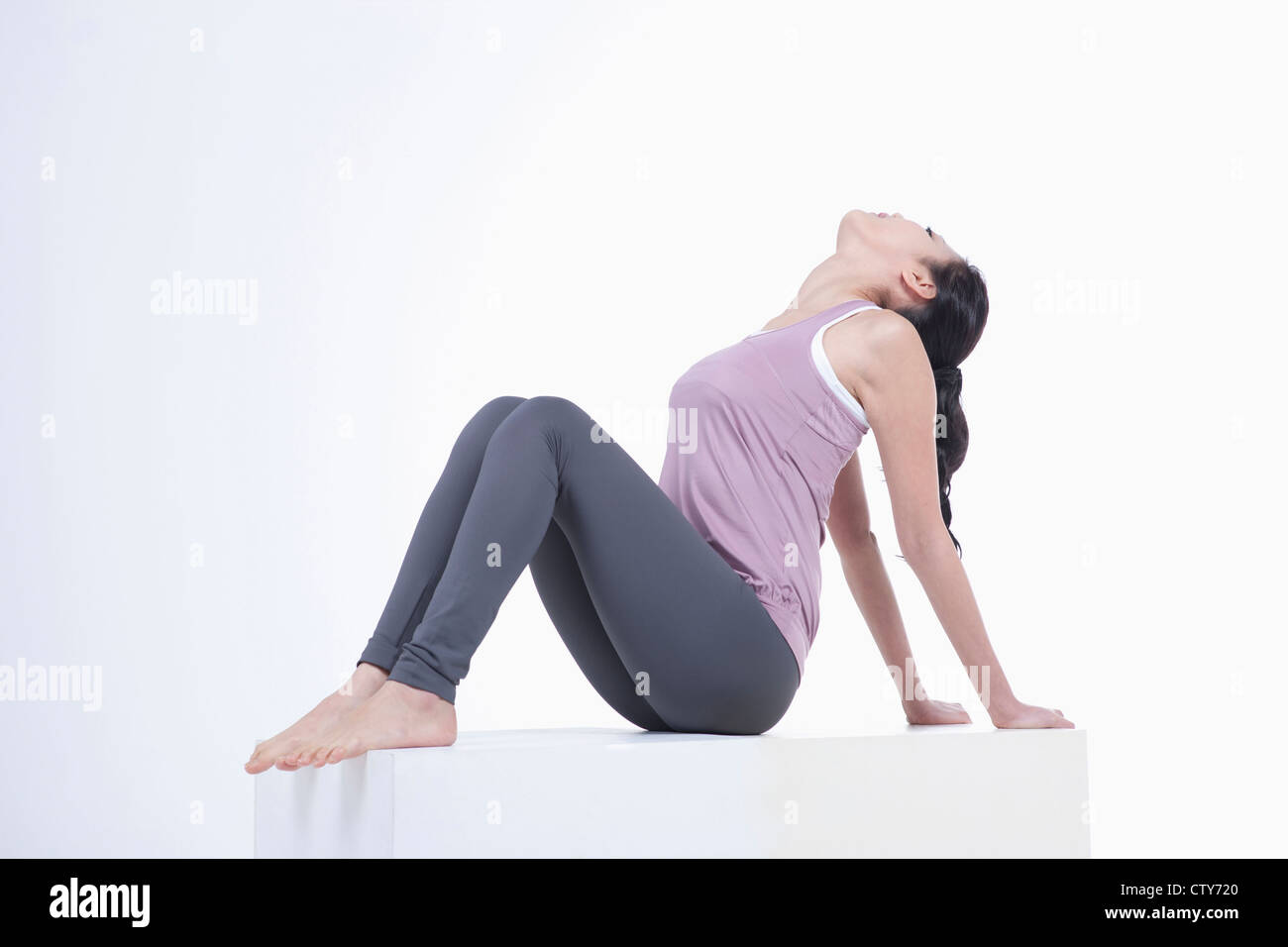 A woman stretching her body Stock Photo - Alamy