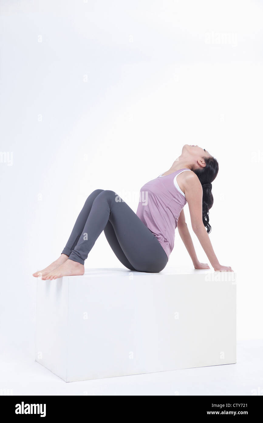 A woman stretching her body Stock Photo - Alamy