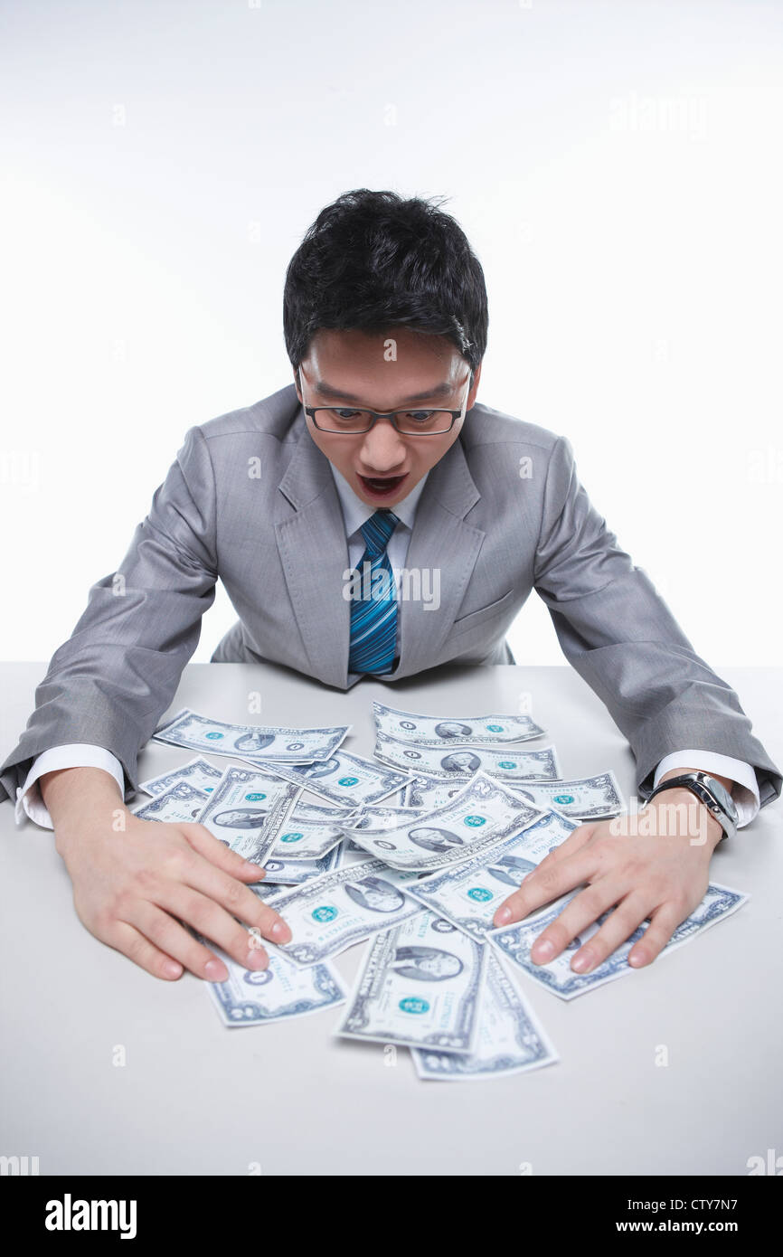 Happy man in money hi-res stock photography and images - Alamy