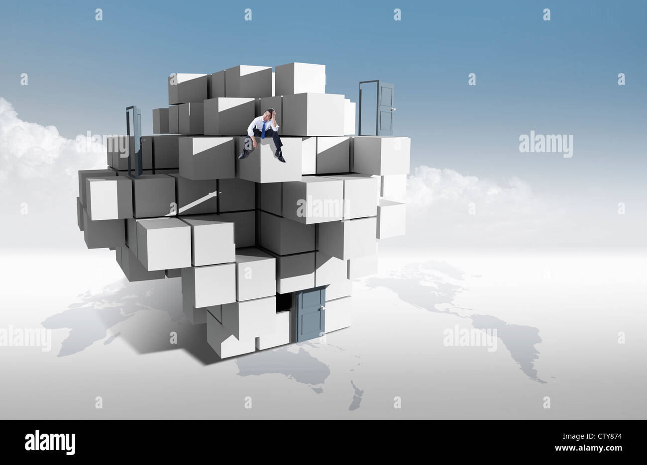 A businessman on the cube block structure Stock Photo - Alamy