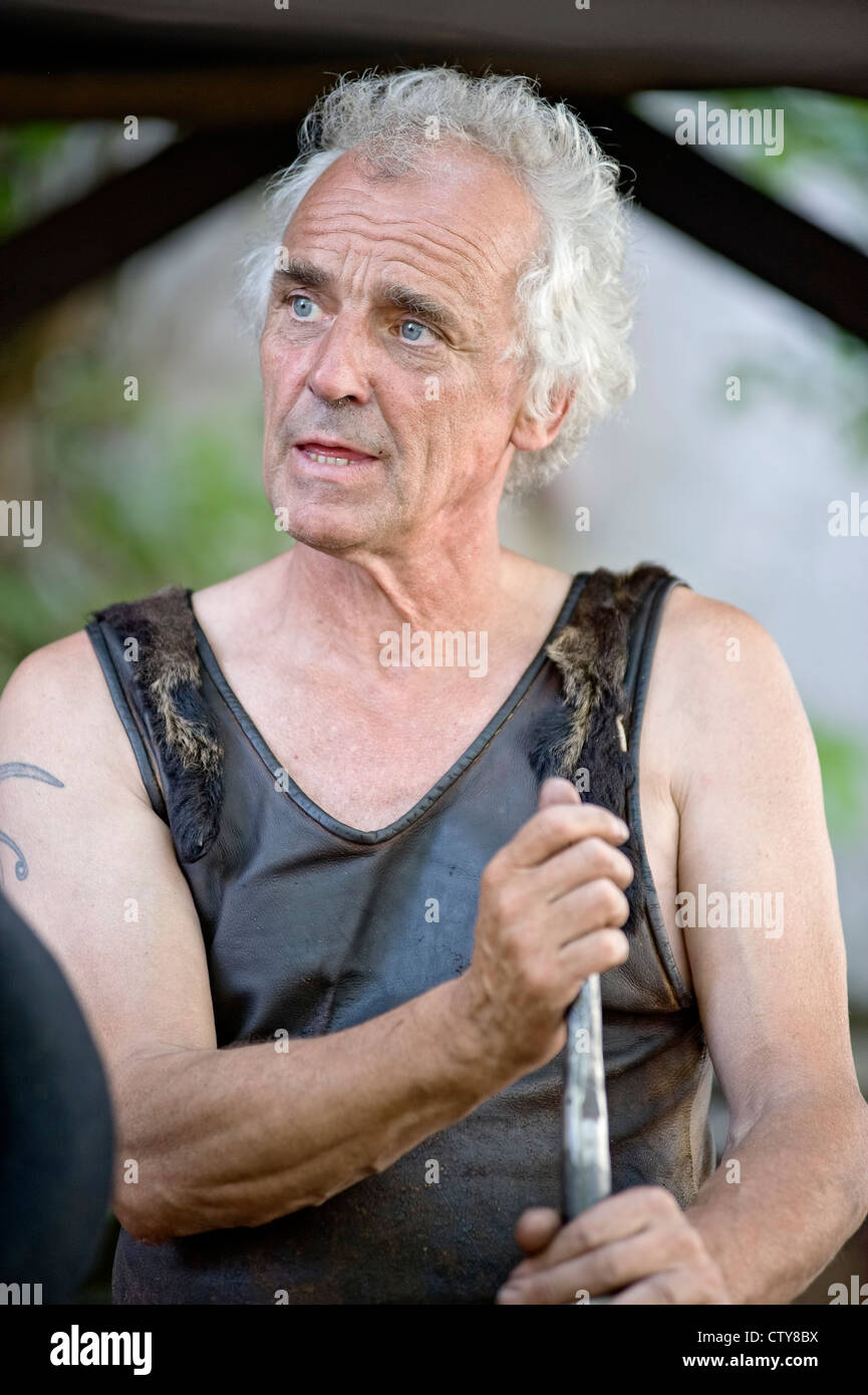 Man medieval festival blacksmith hi-res stock photography and images ...