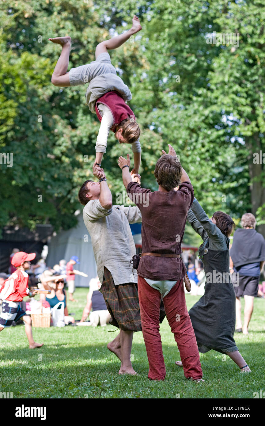 Young abrobats at Gotland's medieval festival Stock Photo - Alamy