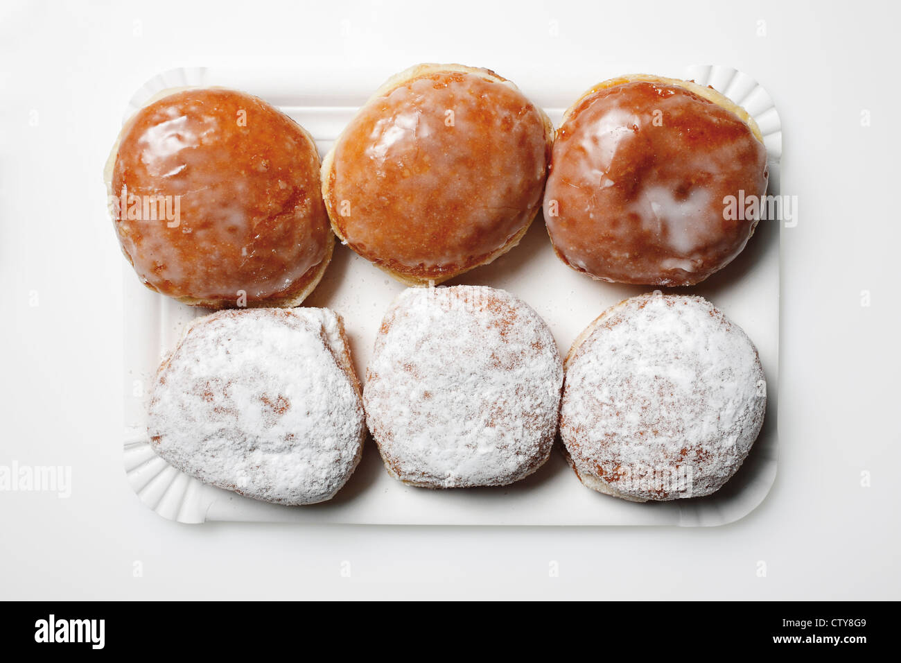Six doughnuts on paper plate Stock Photo - Alamy