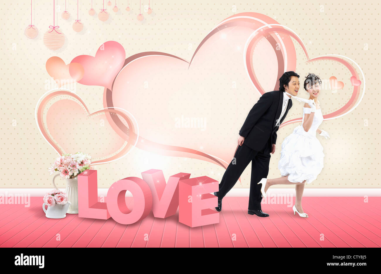 A wedding couple with pink heart Stock Photo - Alamy