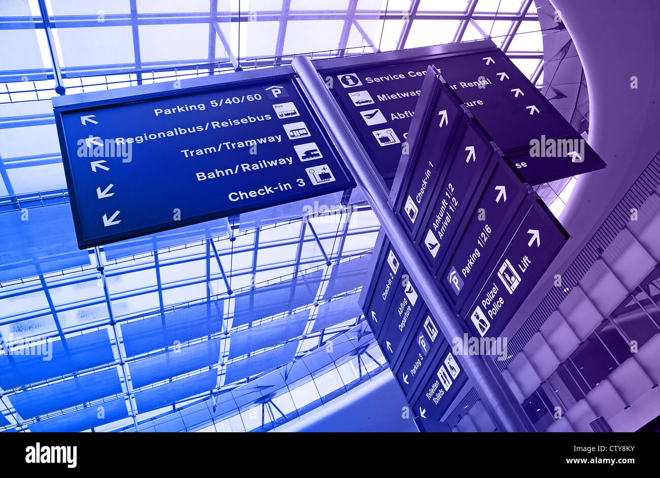 Direction signs in the modern airport Stock Photo - Alamy