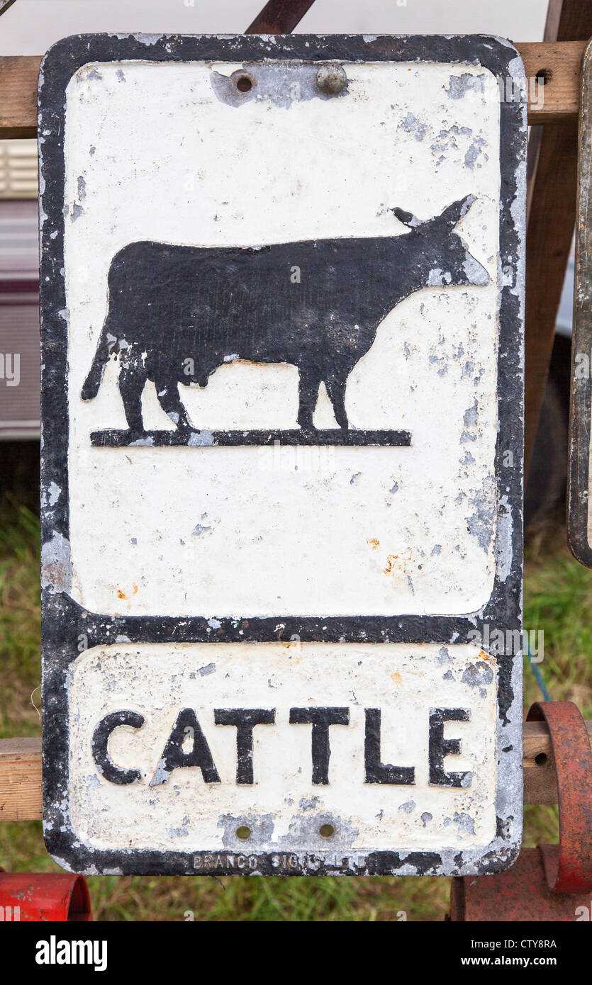 Vintage black and white road traffic sign to warn of cattle Stock Photo ...