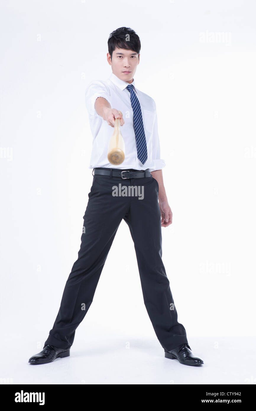 Business man holding baseball bat hi-res stock photography and images ...