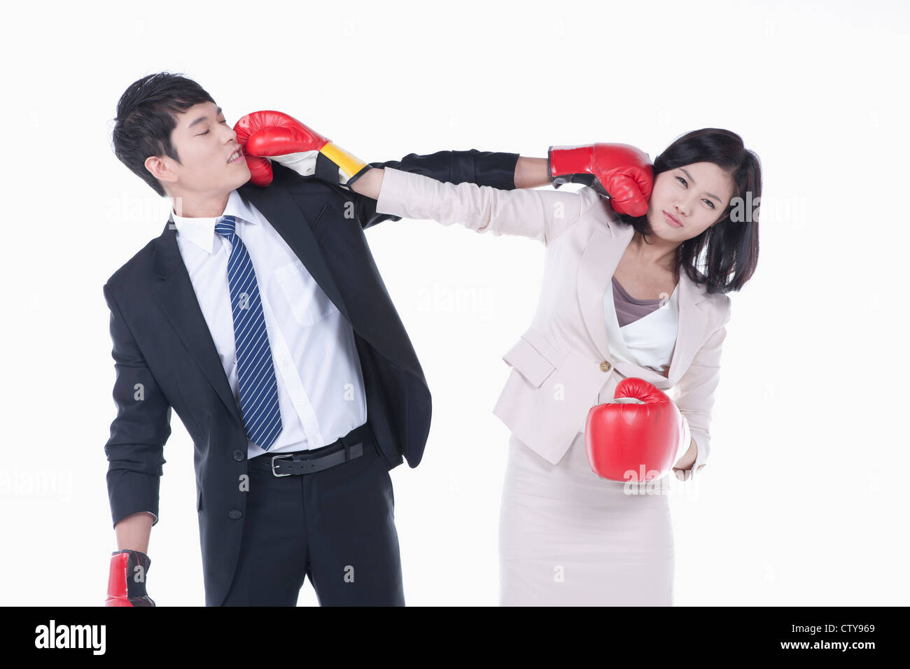 A man and woman punching on each other Stock Photo - Alamy