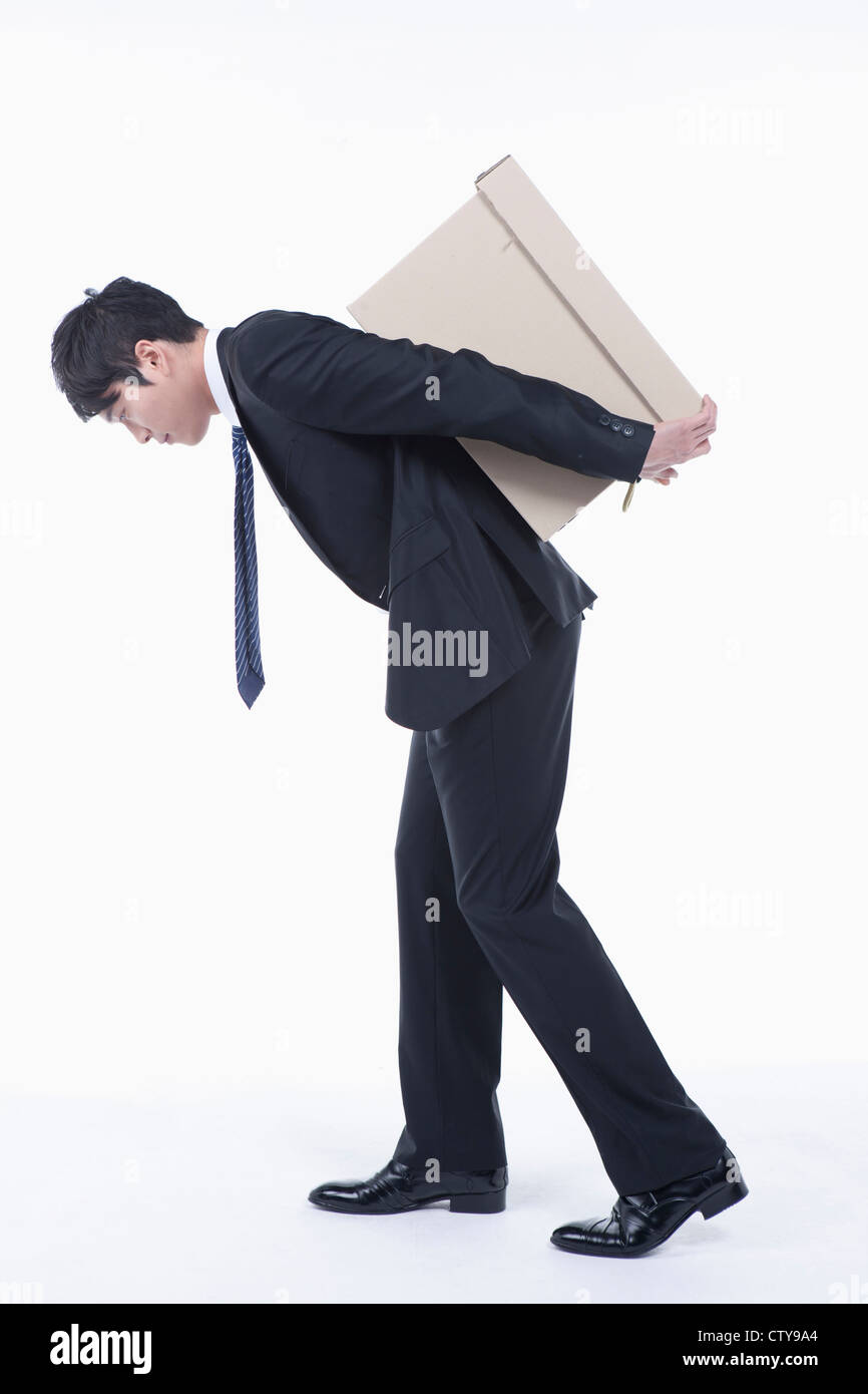 A man moving the box Stock Photo - Alamy