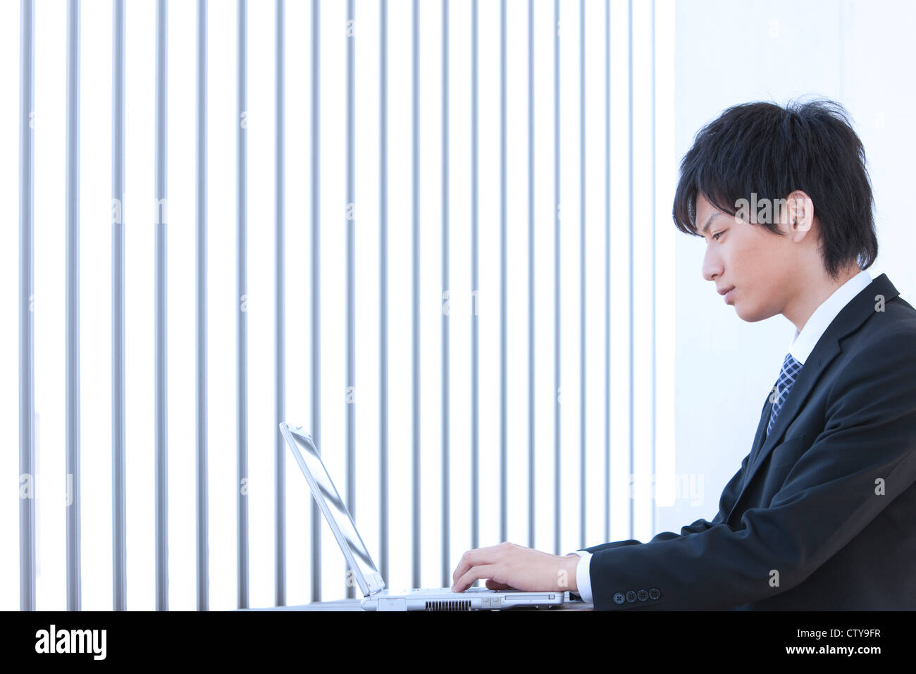 Businessman using technology hi-res stock photography and images - Alamy