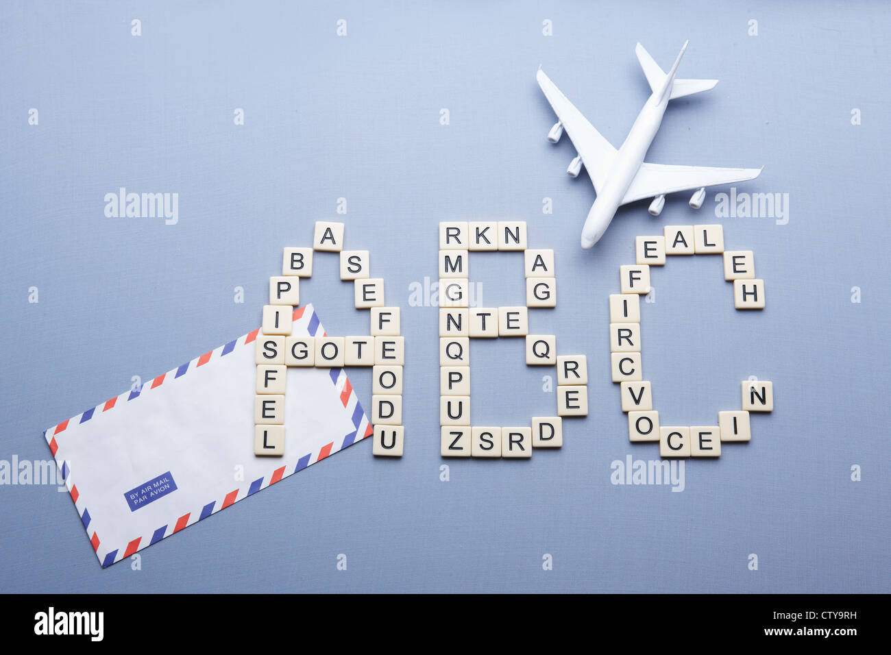 Alphabet ABC blocks with an envelope and airplane Stock Photo - Alamy