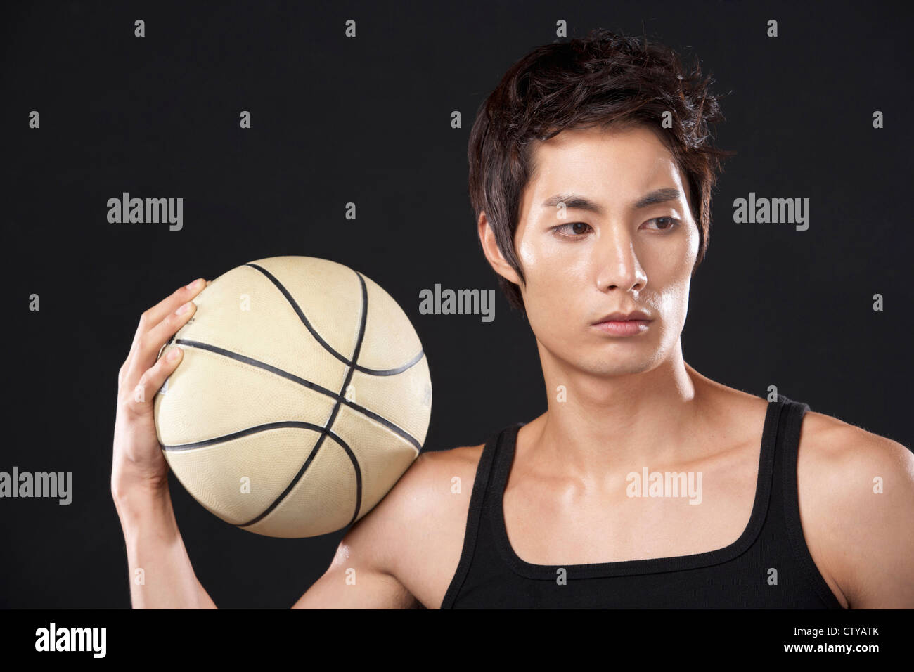A man with a basketball Stock Photo - Alamy