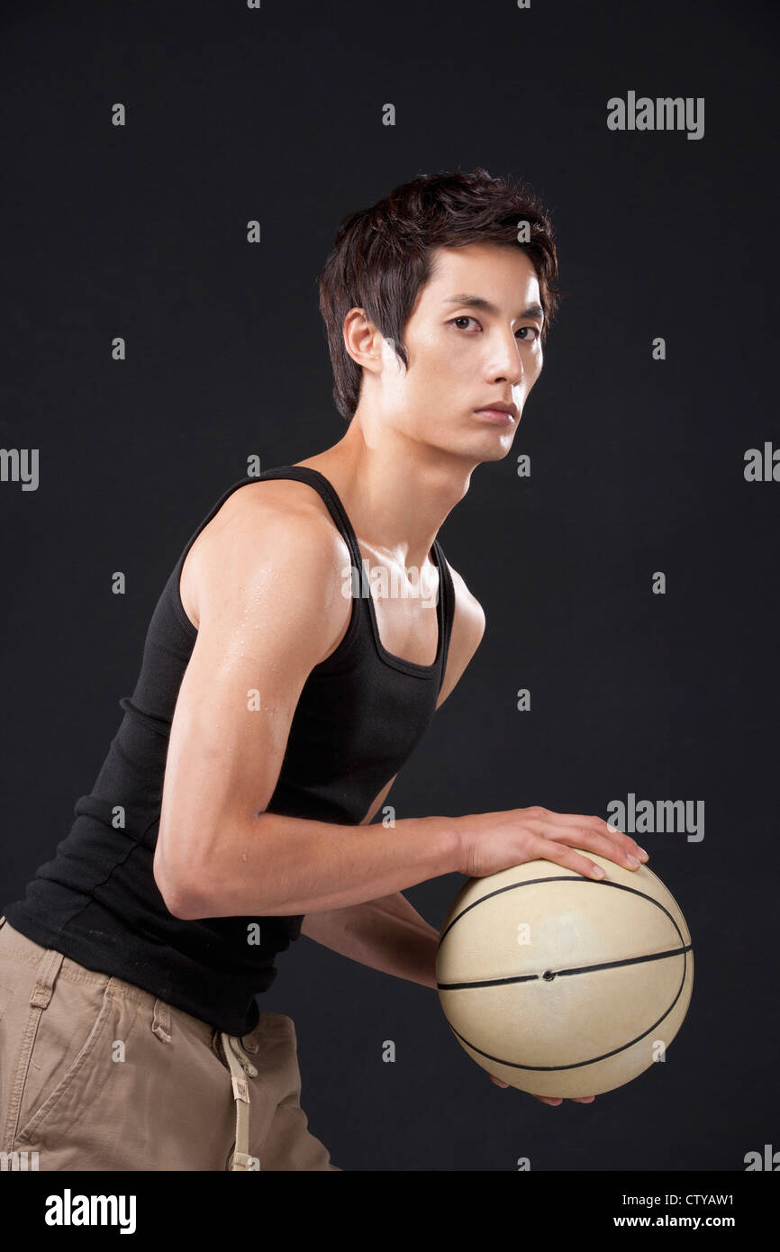 A man playing basketball Stock Photo - Alamy