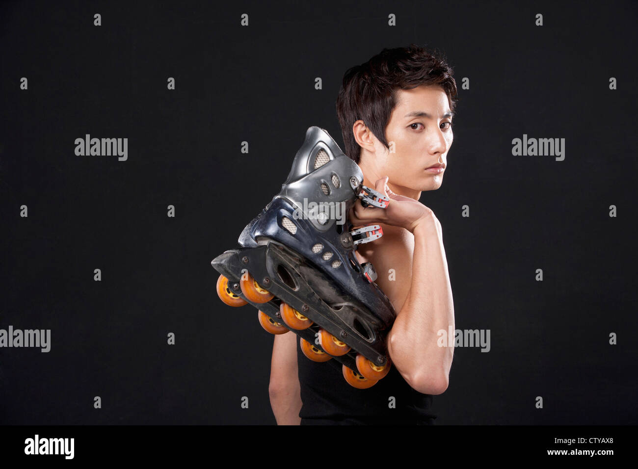 A man with in-line skate Stock Photo - Alamy