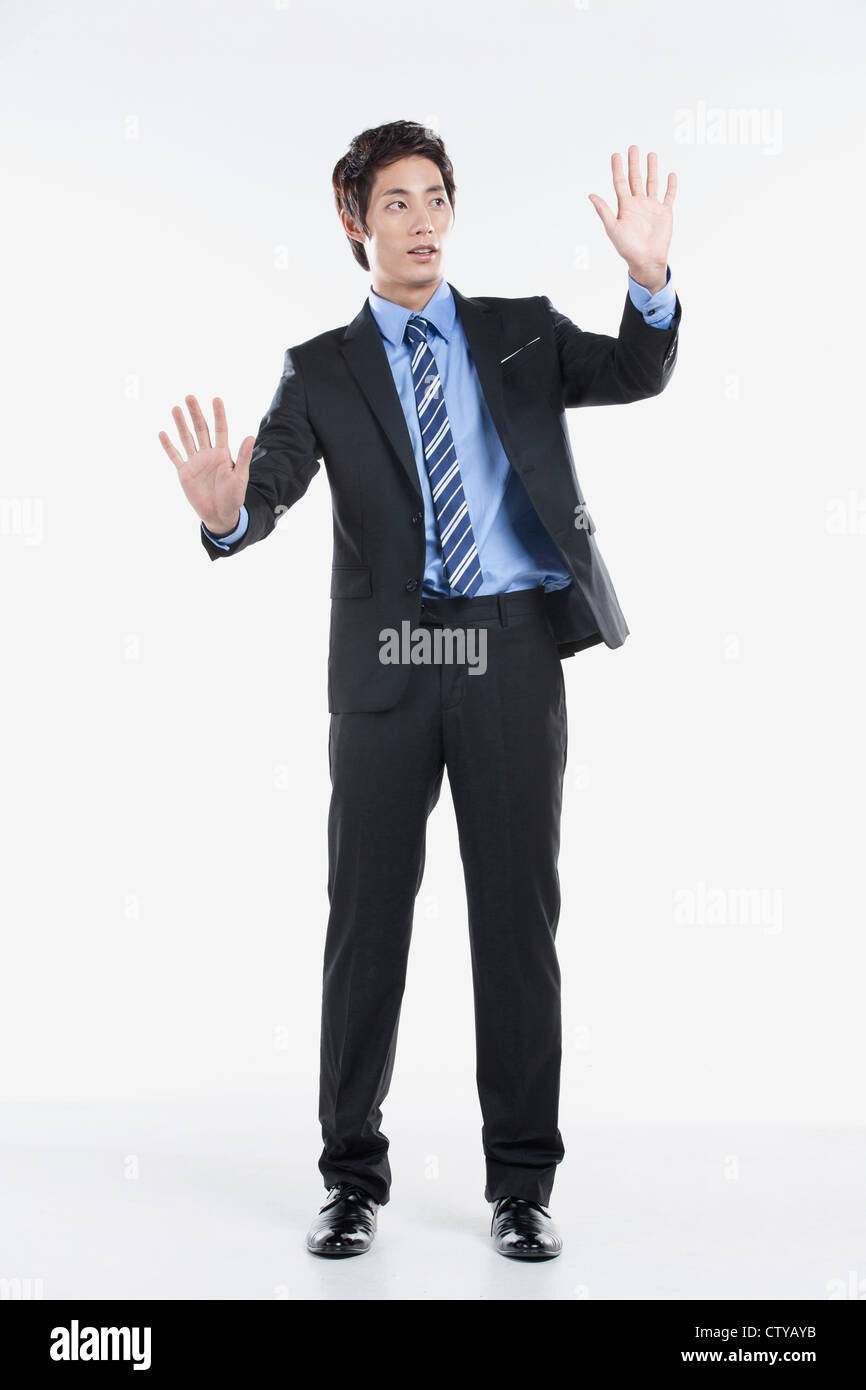 A man touching something with his finger Stock Photo - Alamy