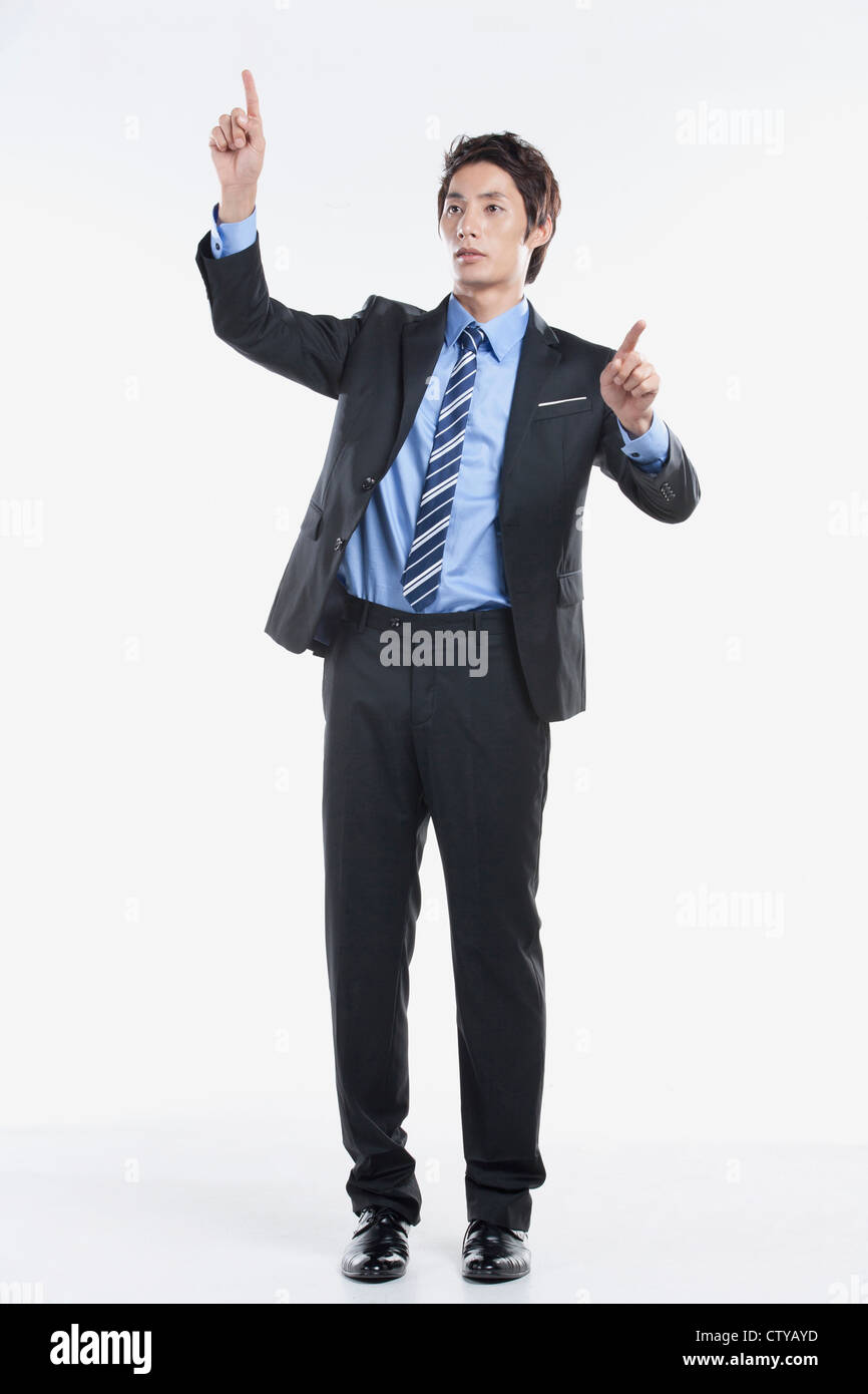 A man touching something with his finger Stock Photo - Alamy