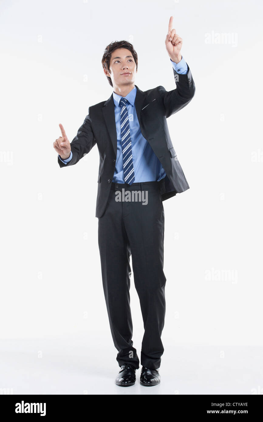 A man touching something with his finger Stock Photo - Alamy