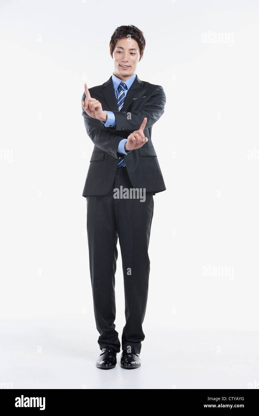 A man touching something with his finger Stock Photo - Alamy