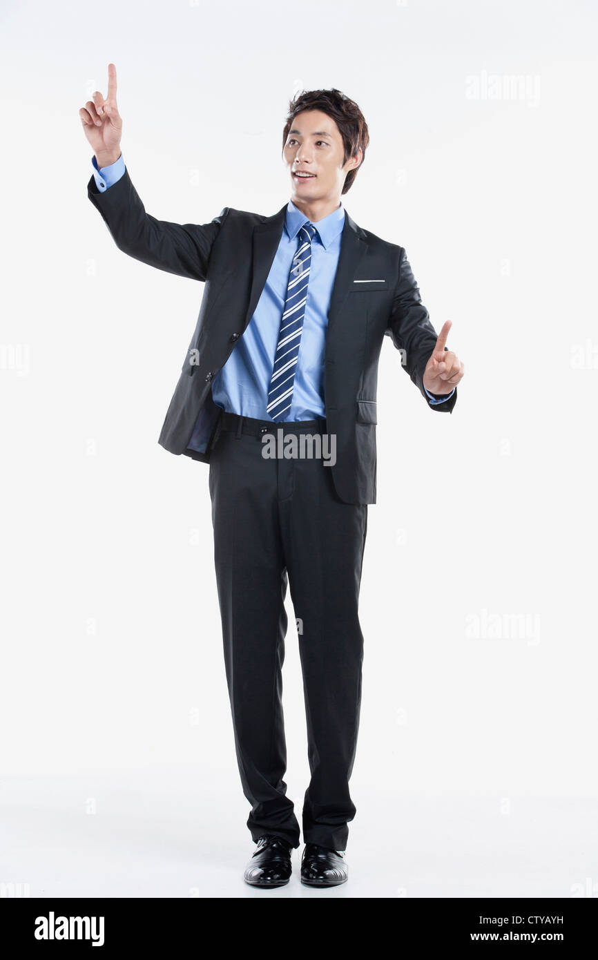 A man touching something with his finger Stock Photo - Alamy