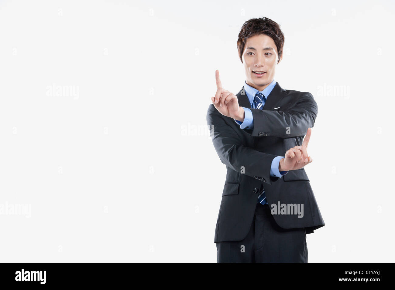 A man touching something with his finger Stock Photo - Alamy