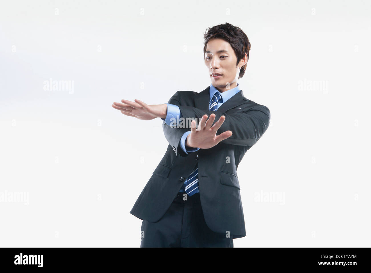 A man touching something with his palm Stock Photo - Alamy