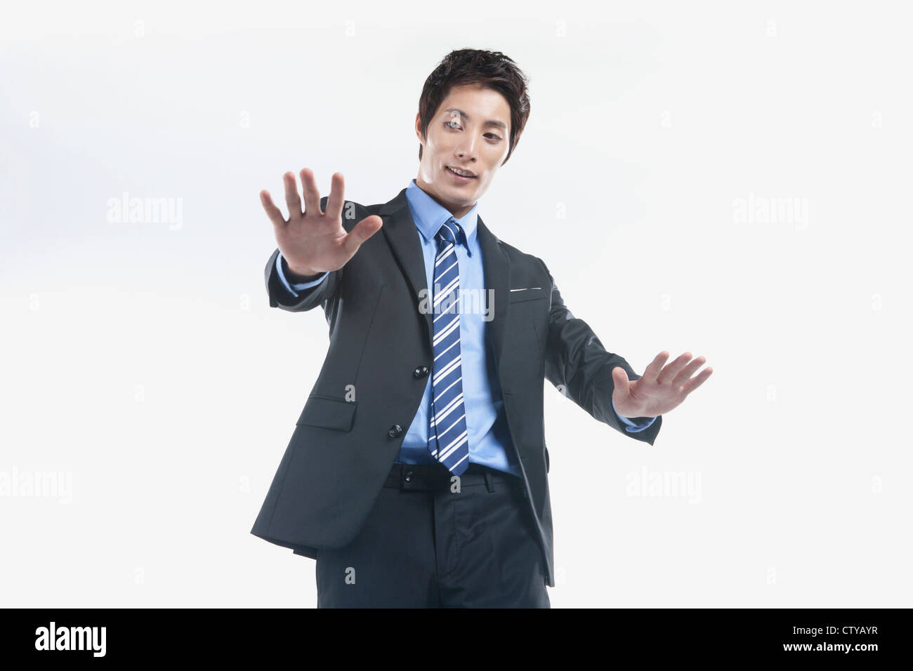 A man touching something with his palm Stock Photo - Alamy