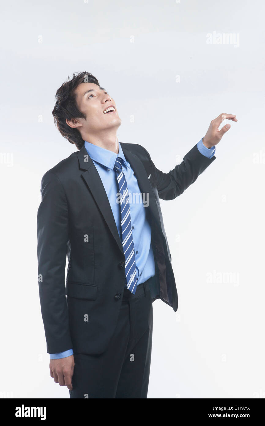 A man reaching his arm Stock Photo - Alamy