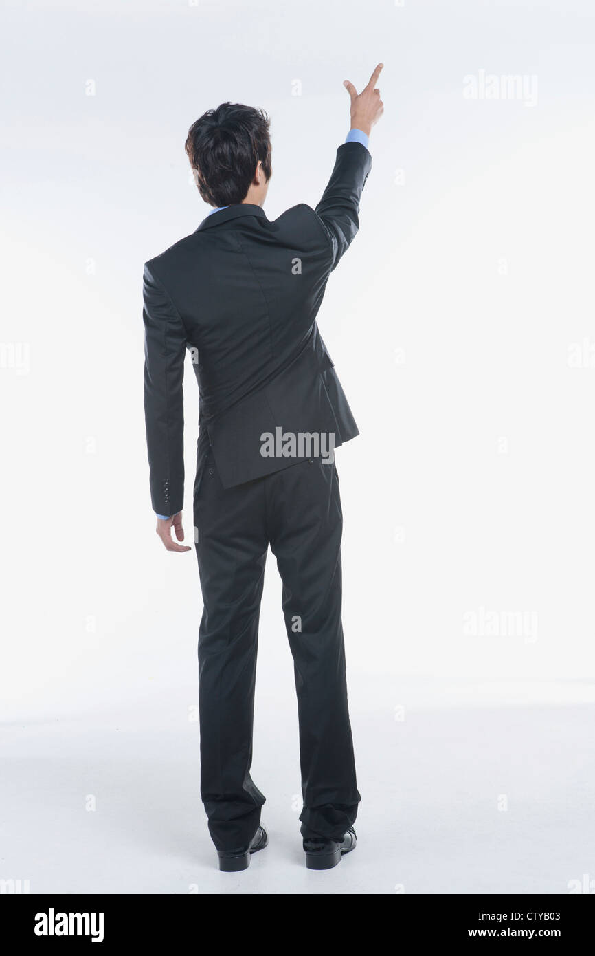 A man pointing something with his finger Stock Photo - Alamy