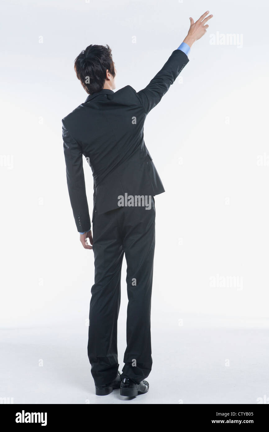 A man pointing something with his finger Stock Photo - Alamy