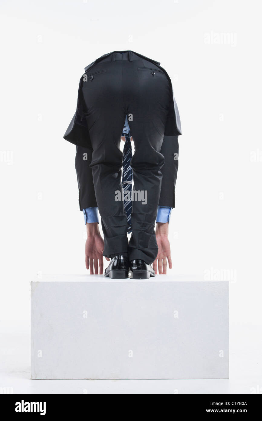 A man bending his waist toward the floor Stock Photo - Alamy