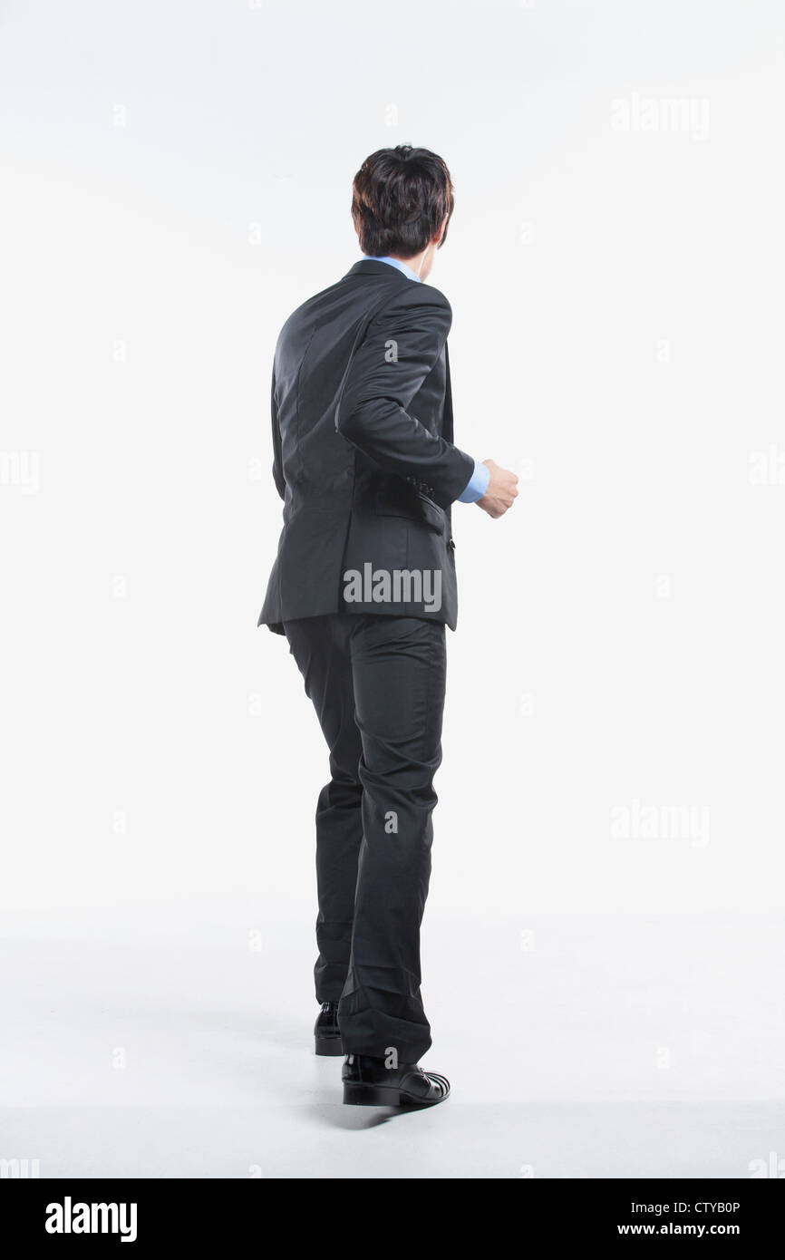 A walking man Stock Photo - Alamy