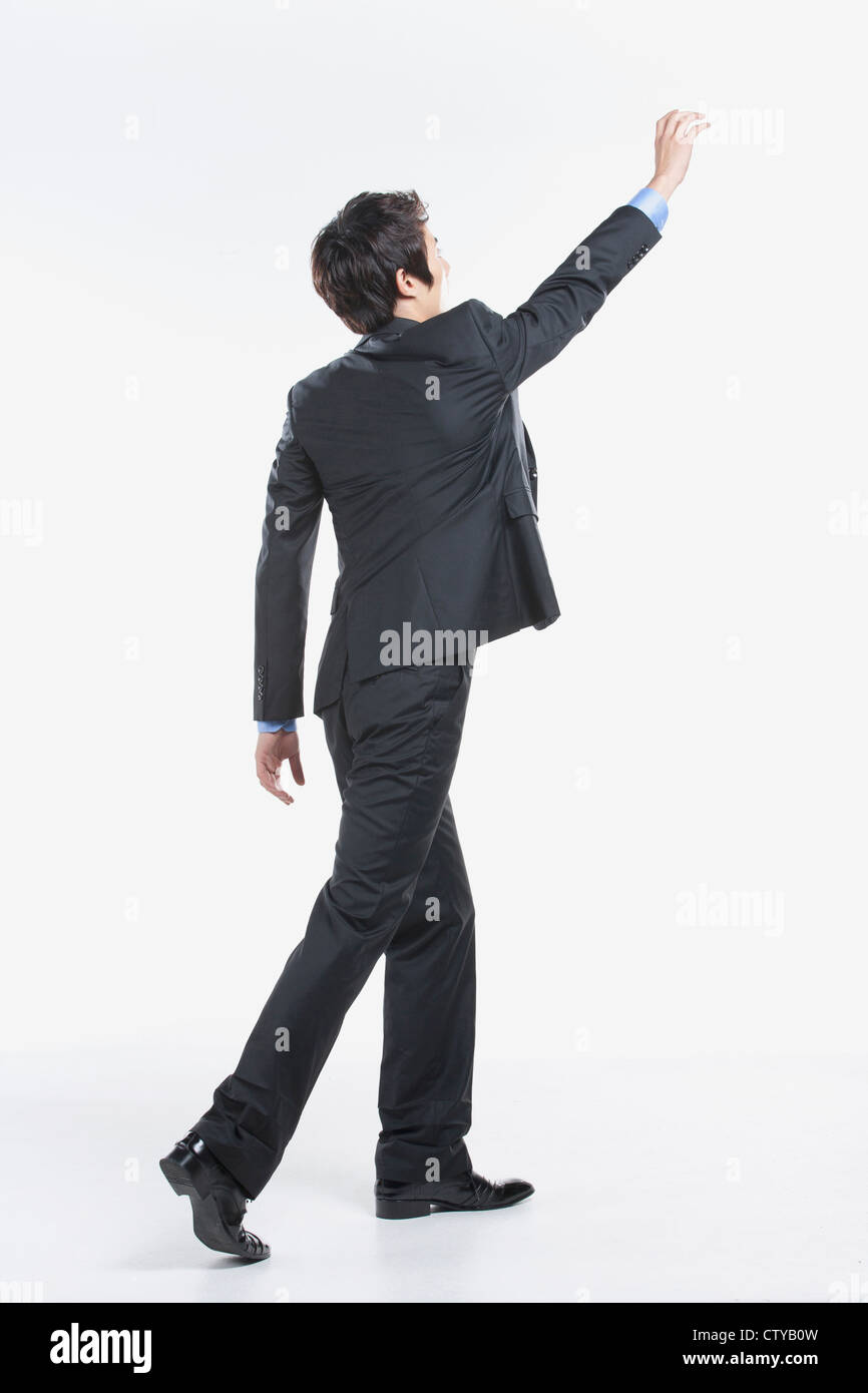 Man trying catch something hi-res stock photography and images - Alamy