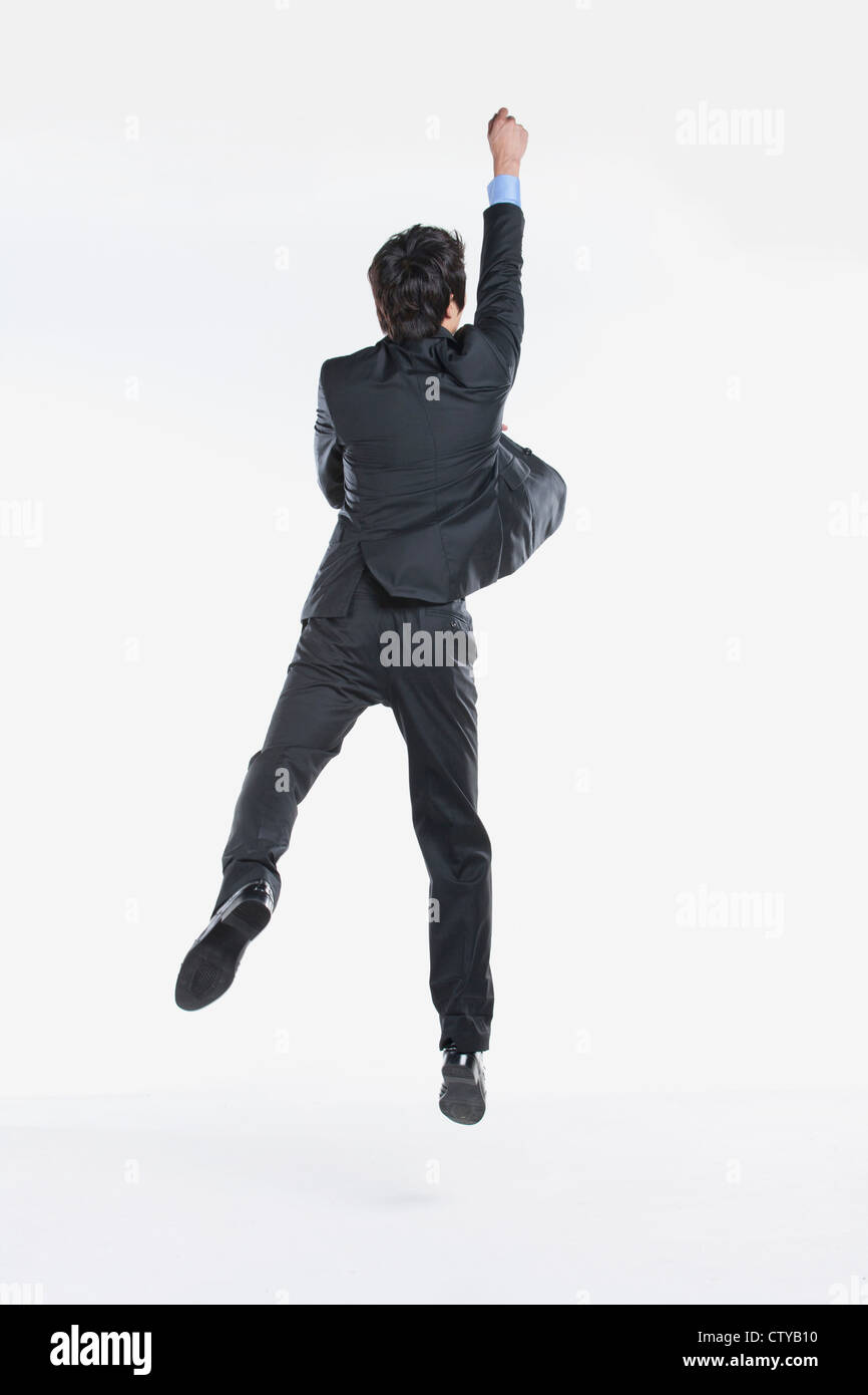 A man trying to catch something Stock Photo - Alamy