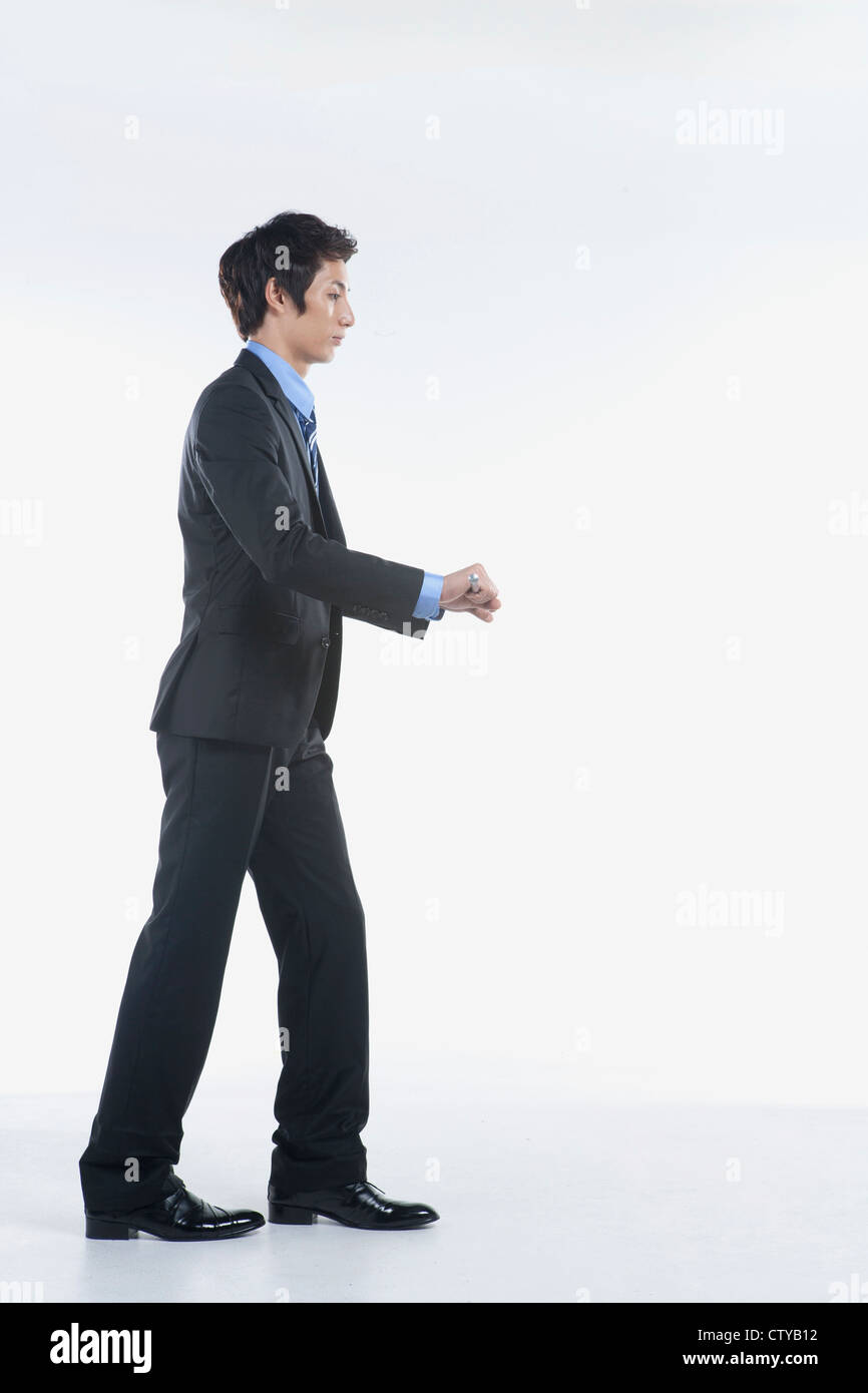 A man pushing something Stock Photo - Alamy