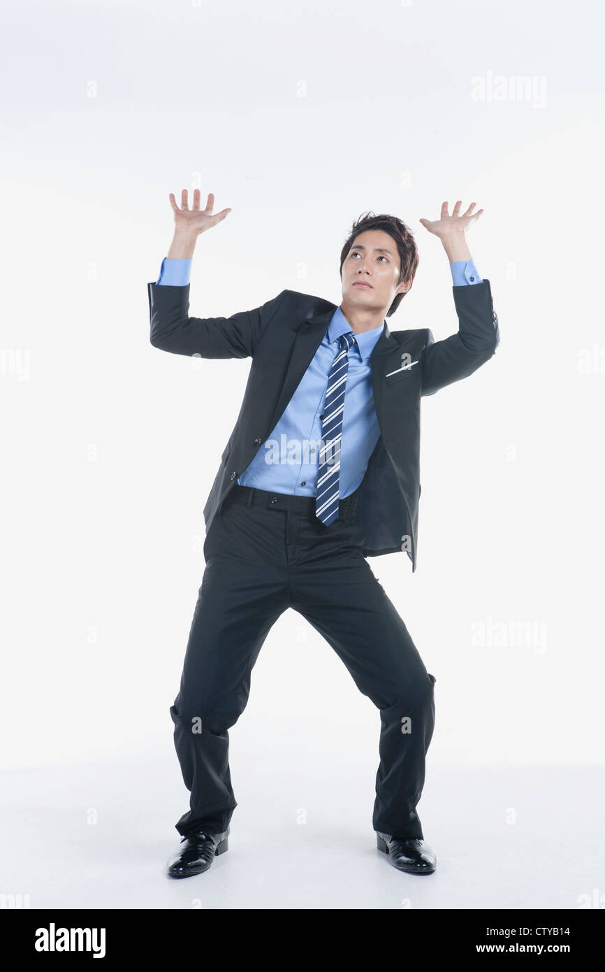 A man holding up the something Stock Photo - Alamy