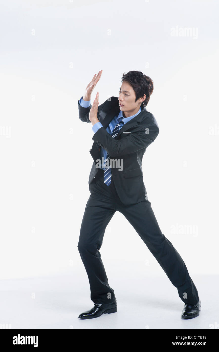 A man pushing something Stock Photo - Alamy