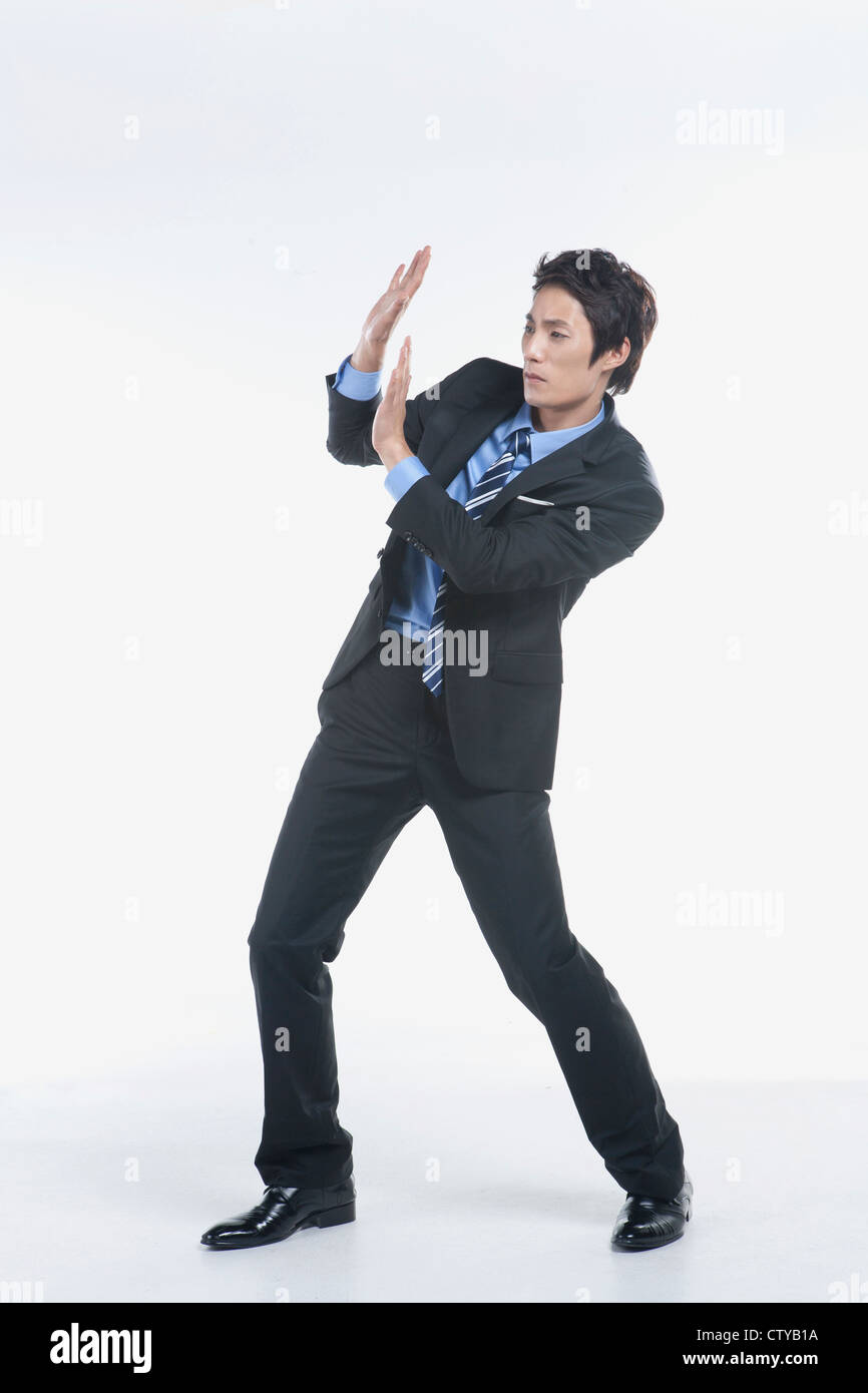 A man pushing something Stock Photo - Alamy