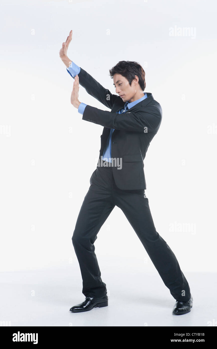 A man pushing something Stock Photo - Alamy